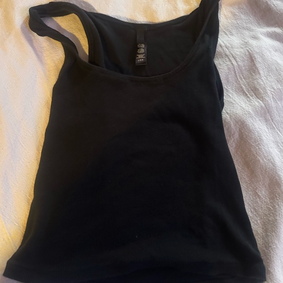 SKIMS | Tops | Skims Black Fitted Sleeveless Tank Top | Poshmark